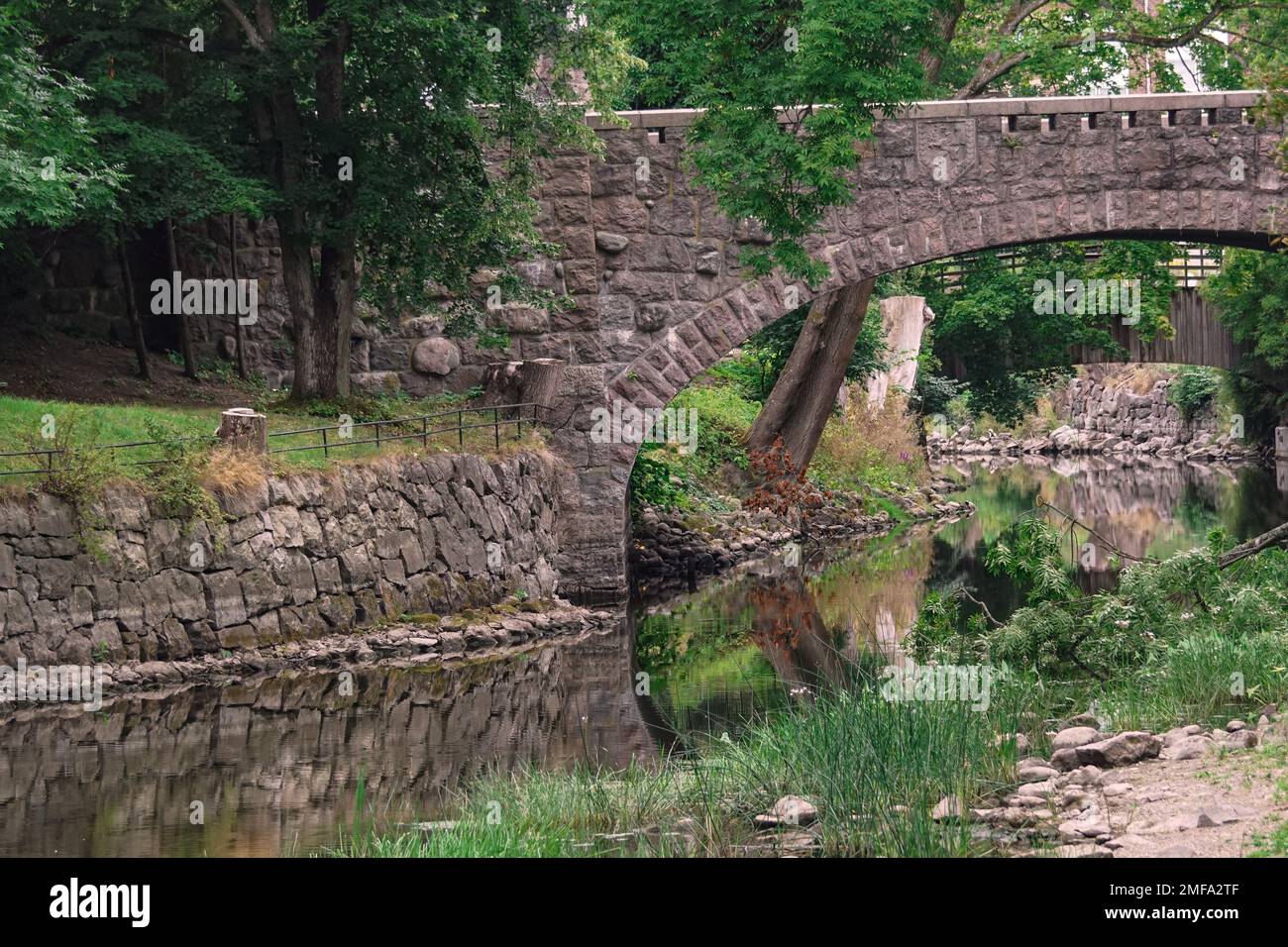 View of old stone bridge over river Stock Photo - Alamy
