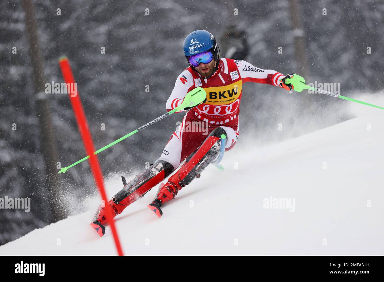 Austria's Marco Schwarz speeds down the course during an alpine ski ...