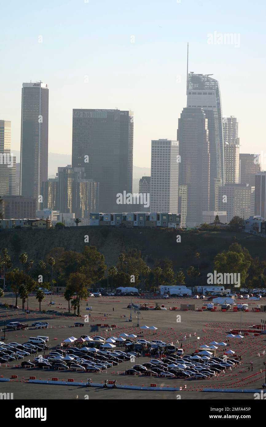 Motorists line up at a COVID-19 vaccination site at Dodger Stadium ...