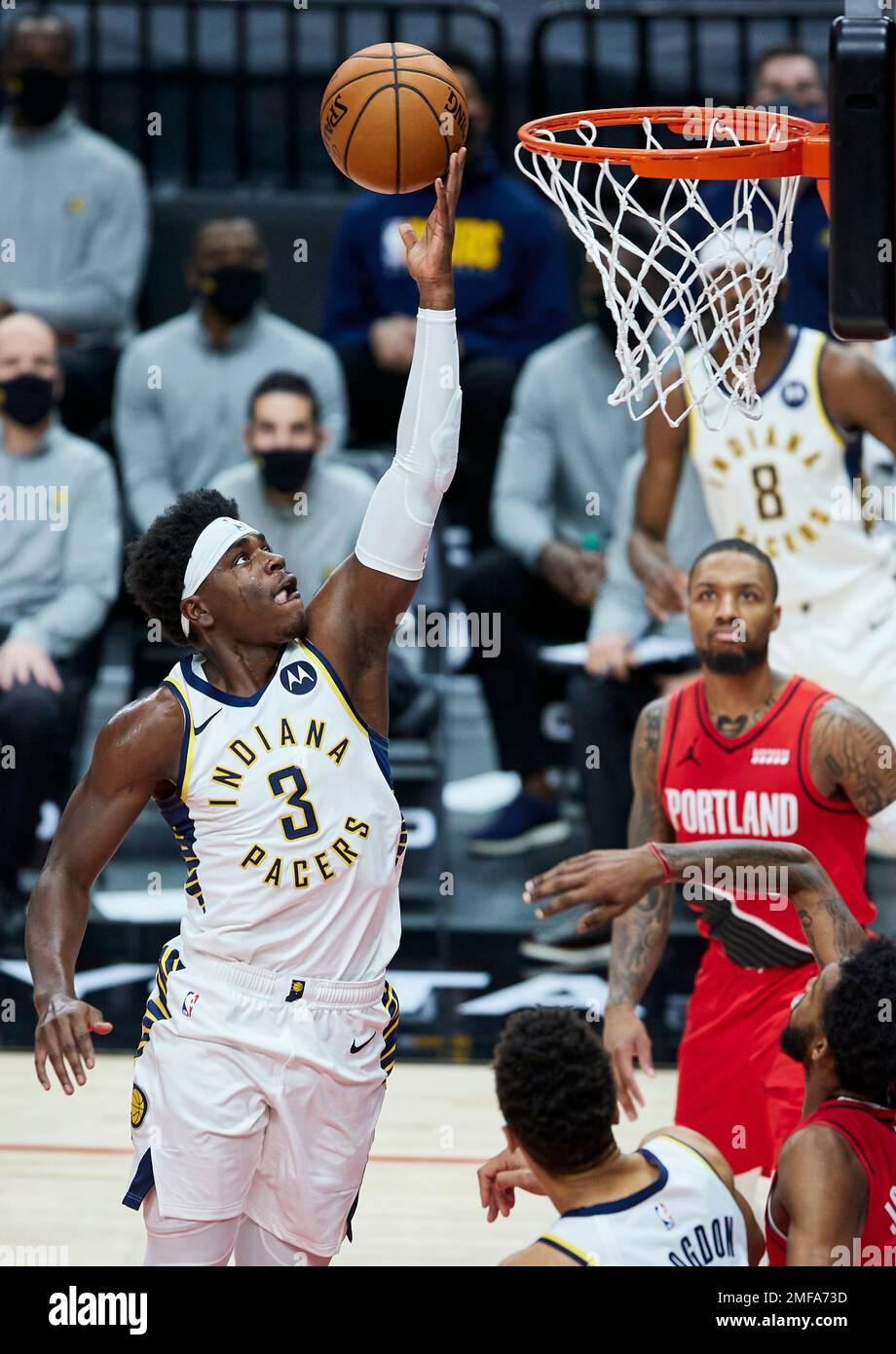 Indiana Pacers guard Aaron Holiday (3) shoots against the Portland ...