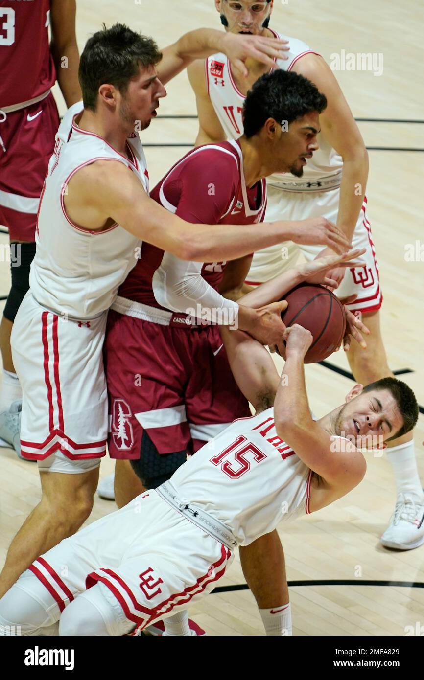 Stanford forward Jaiden Delaire, center, battles for a rebound against ...