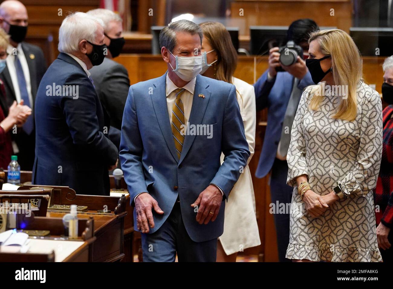 Georgia Gov. Brian Kemp leaves with his wife Marty after delivering his ...
