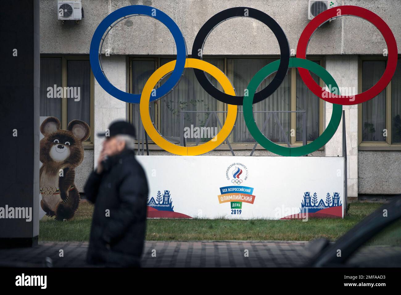 FILE - In this Nov. 28, 2019 file photo Olympic Rings and a model of ...