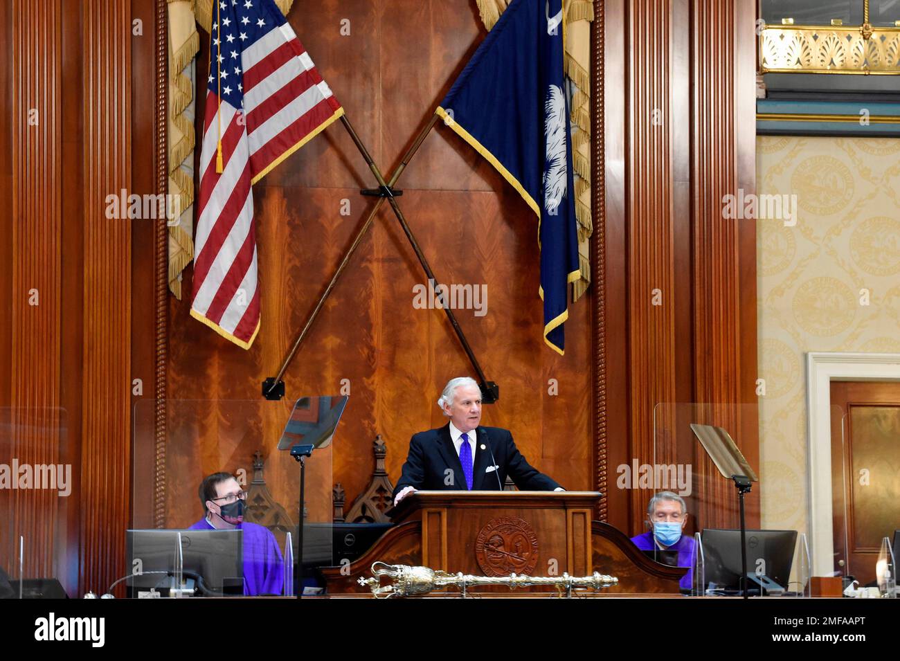 South Carolina Gov. Henry McMaster, center, gives his State of the ...
