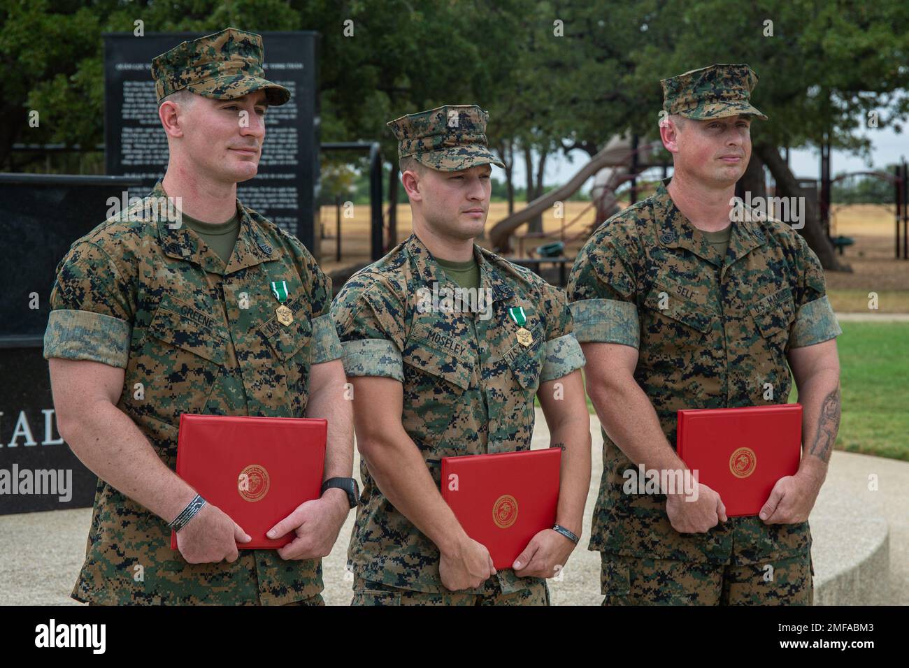 U.S. Marine Corps Staff Sgt. Dylan Greene, left, Staff Sgt. Dalmon ...