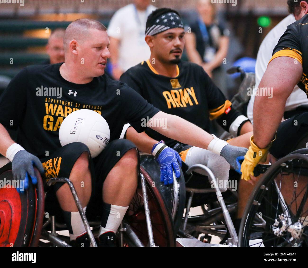 U.S. Army Spc. Gerald Blakely reaches out to help his teammate during ...