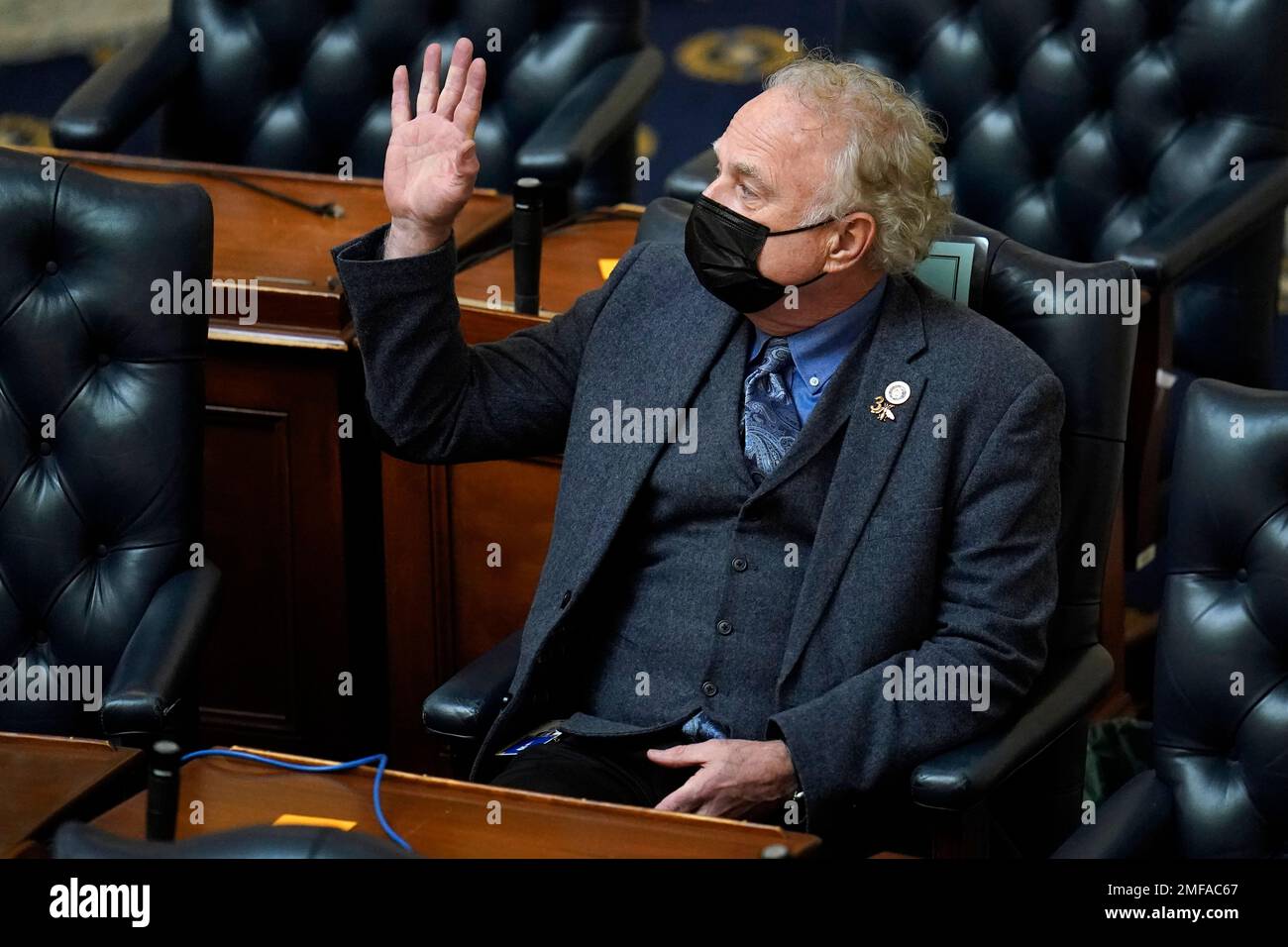 Maryland Del. Ken Kerr, D-Frederick County, waves at a house member ...