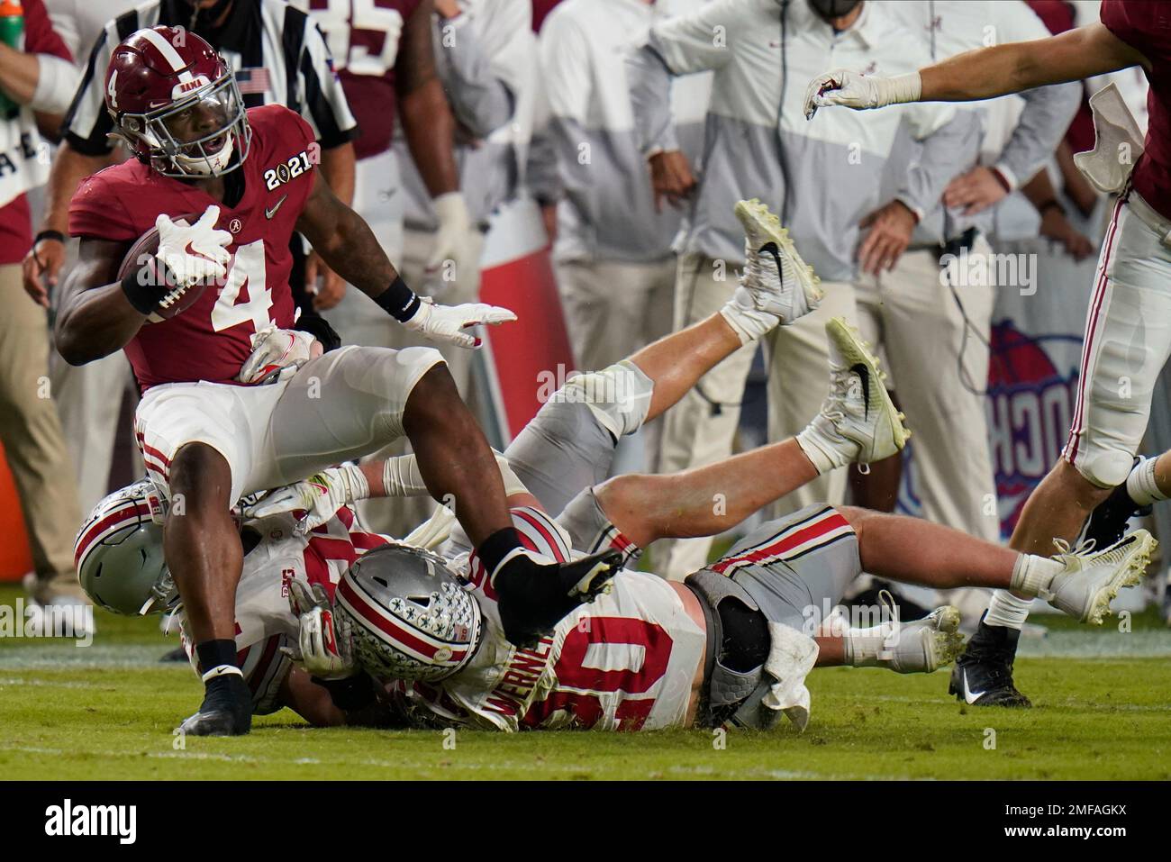 Alabama running back Brian Robinson Jr. is tackled by Ohio State during ...
