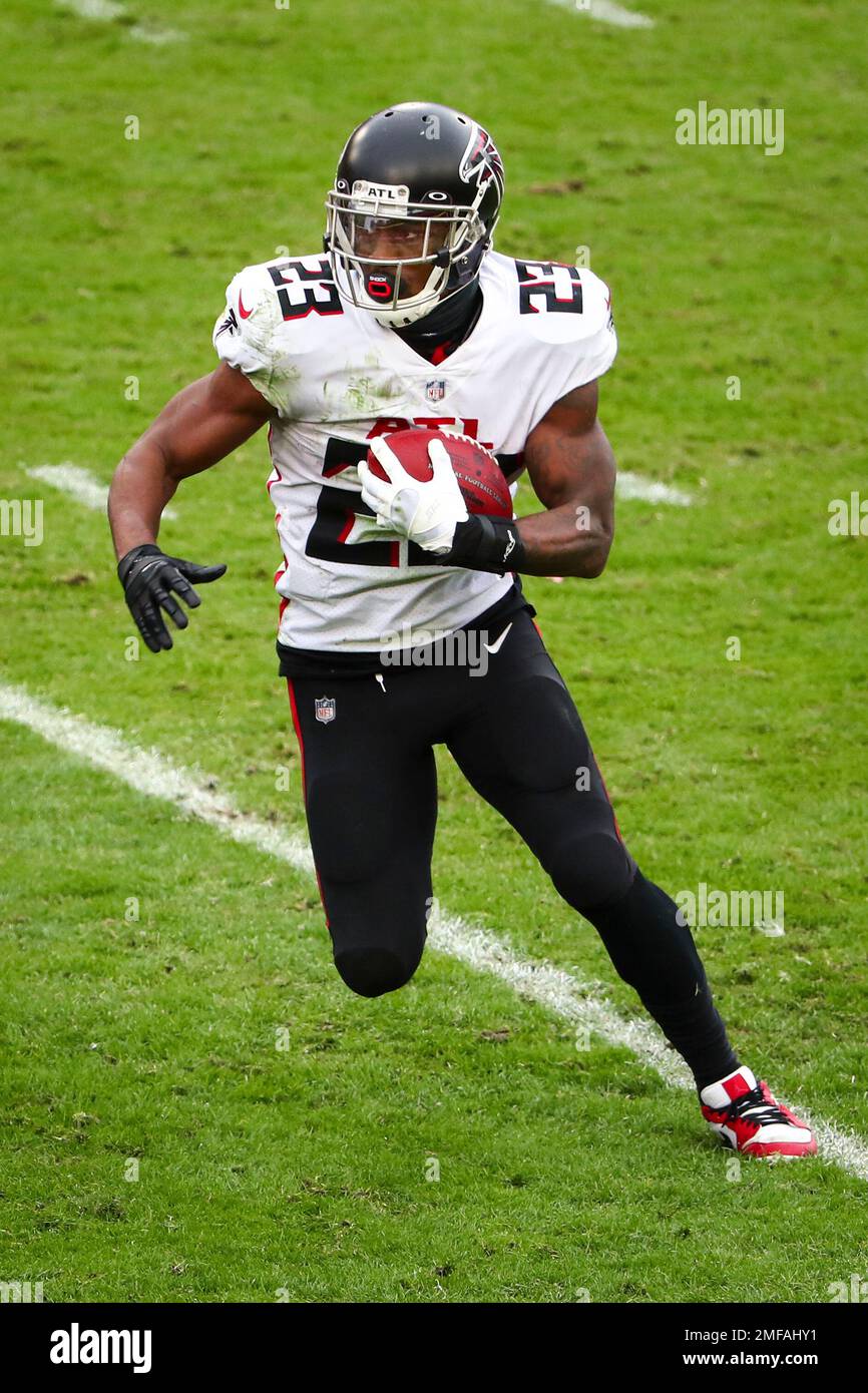 Atlanta Falcons running back Brian Hill (23) carries the ball during ...