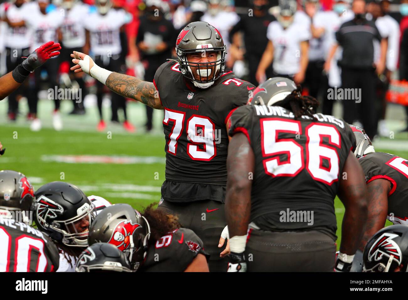 Tampa Bay Buccaneers defensive end Pat O'Connor (79) signals to the ...