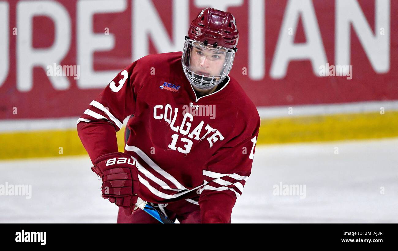 Colgate forward Matt Verboon (13) skates against St. Lawrence during an ...