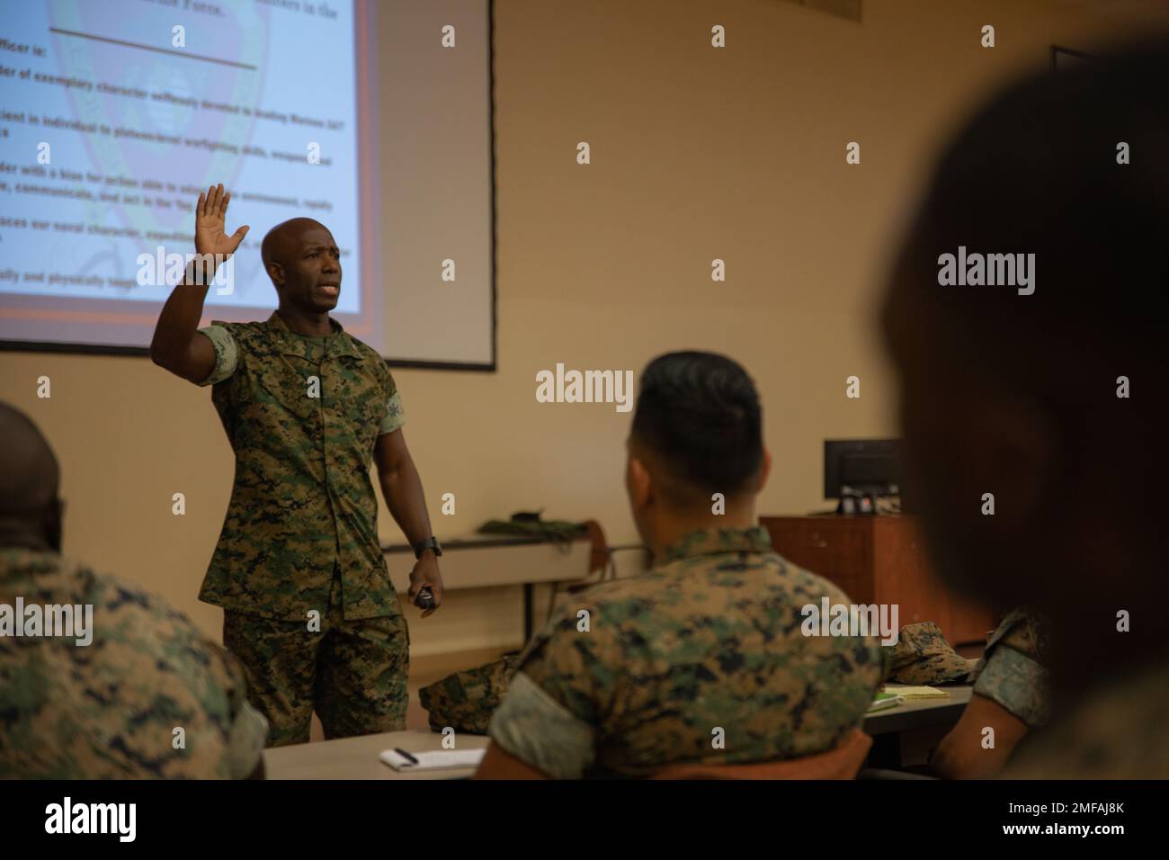 Col. Reginald McClam, commanding officer of The Basic School, addresses ...