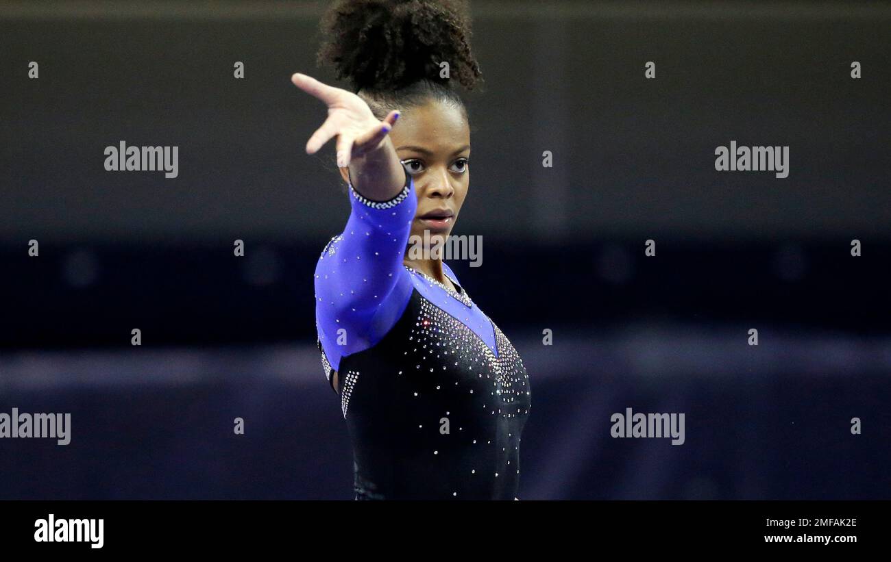 Florida's Trinity Thomas performs on the beam during an NCAA gymnastics ...