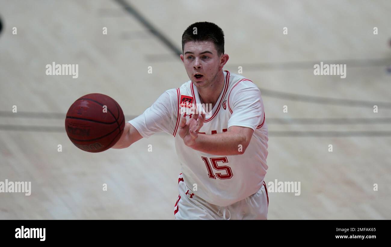 Utah guard Rylan Jones (15) brings the ball up court in the second half ...