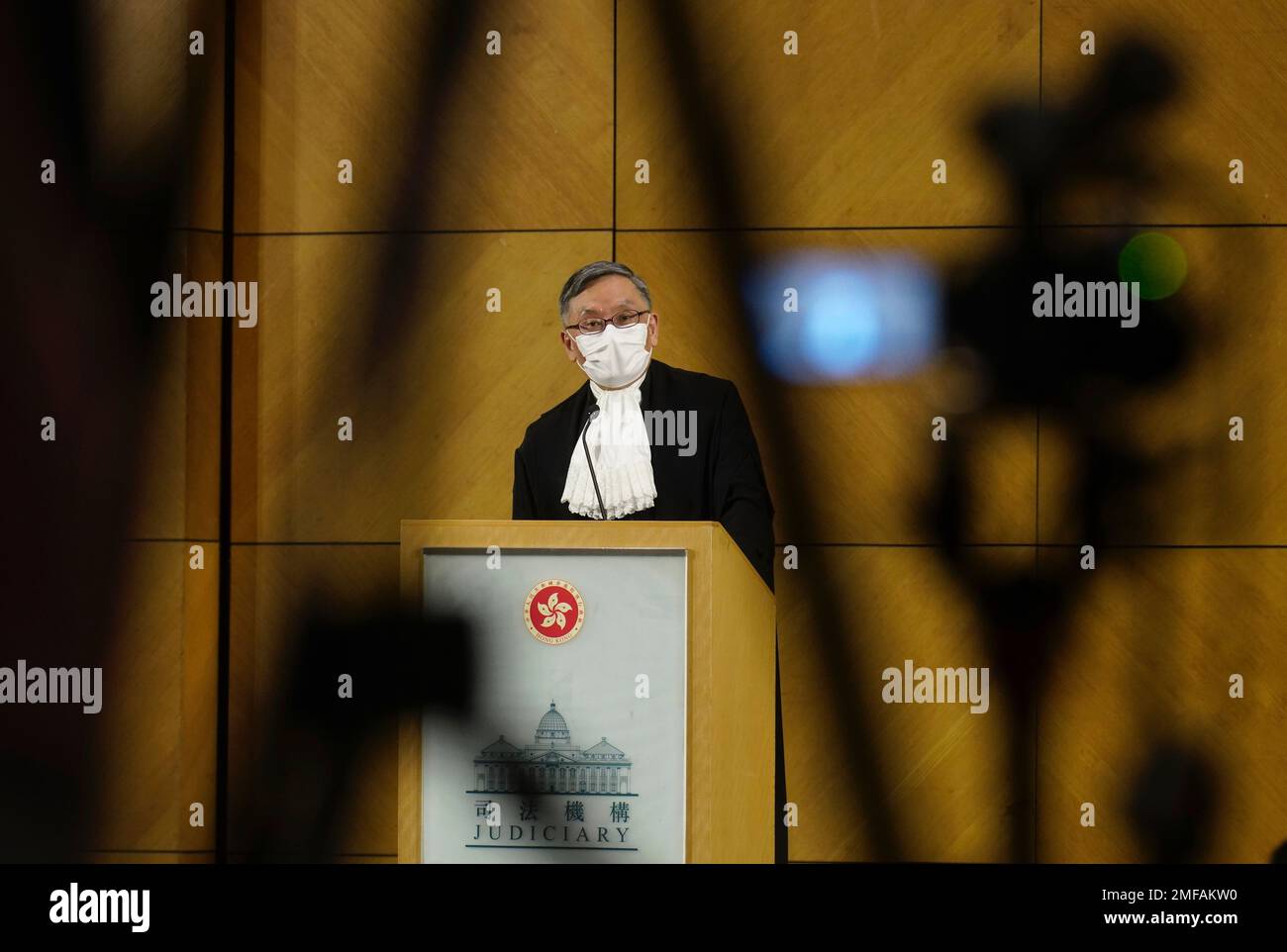 New Hong Kong Chief Justice Andrew Cheung listens to reporters ...