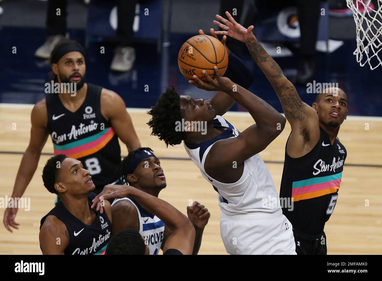Minnesota Timberwolves' Anthony Edwards (1) shoots the ball over San ...