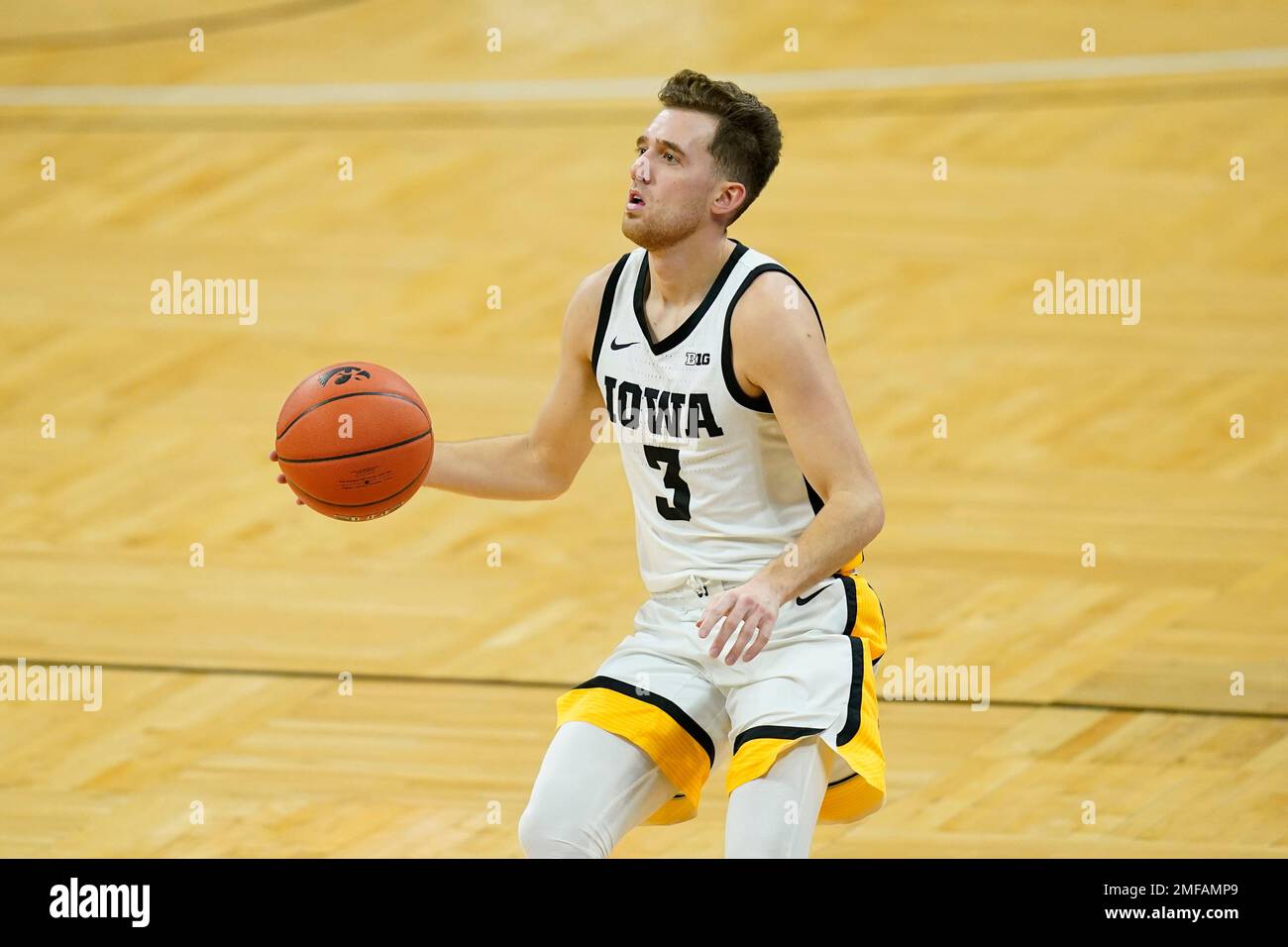 Iowa guard Jordan Bohannon drives up court during the second half of an ...