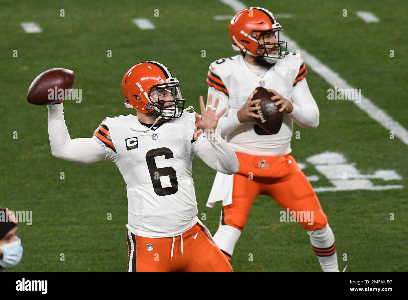 Cleveland Browns quarterbacks Baker Mayfield, front, and Cleveland ...