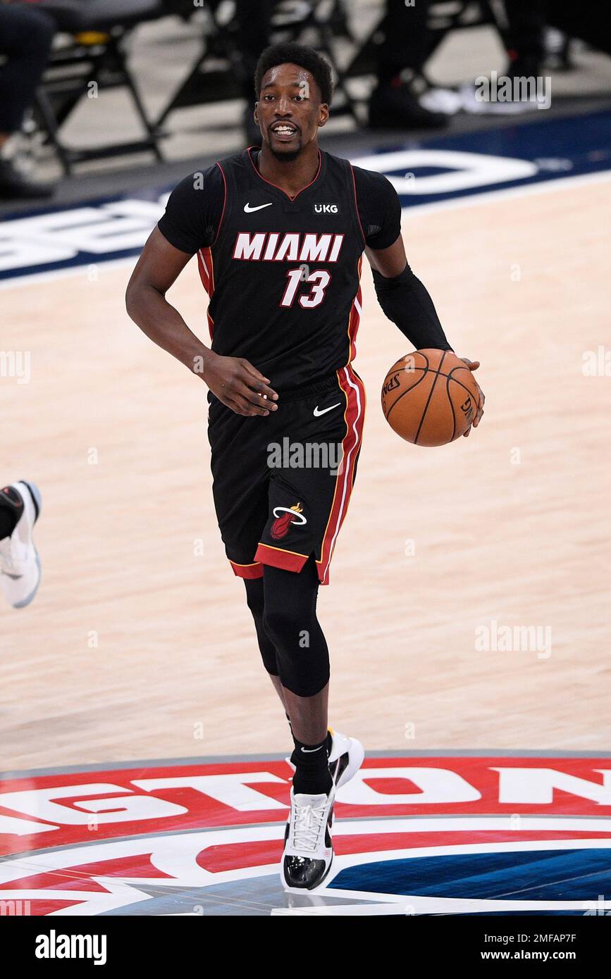 Miami Heat center Bam Adebayo (13) dribbles the ball during the second ...