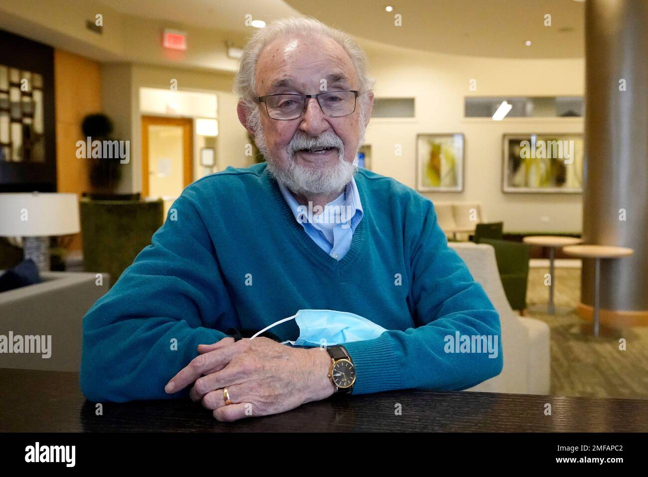 Aaron Jaffe poses for a photo at his apartment lounge in Evanston, Ill ...