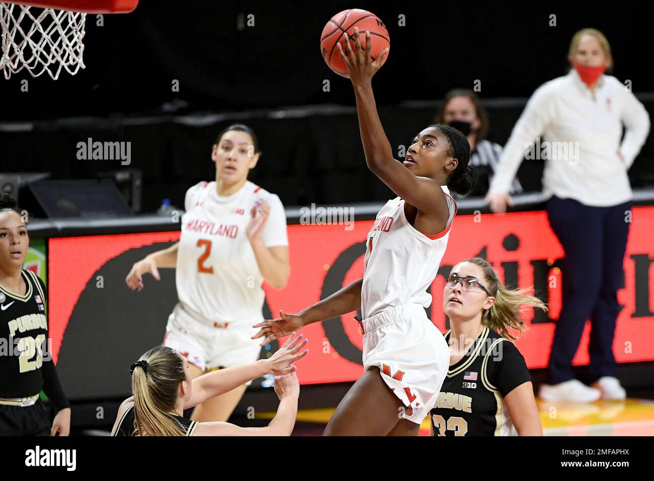 Maryland guard Diamond Miller (1) shoots in front of Purdue defenders ...