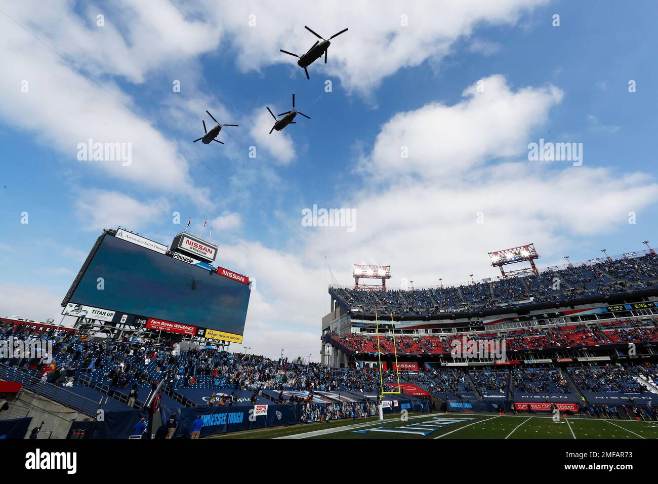 Helicopters fly over Nissan Stadium before an NFL wild-card playoff ...