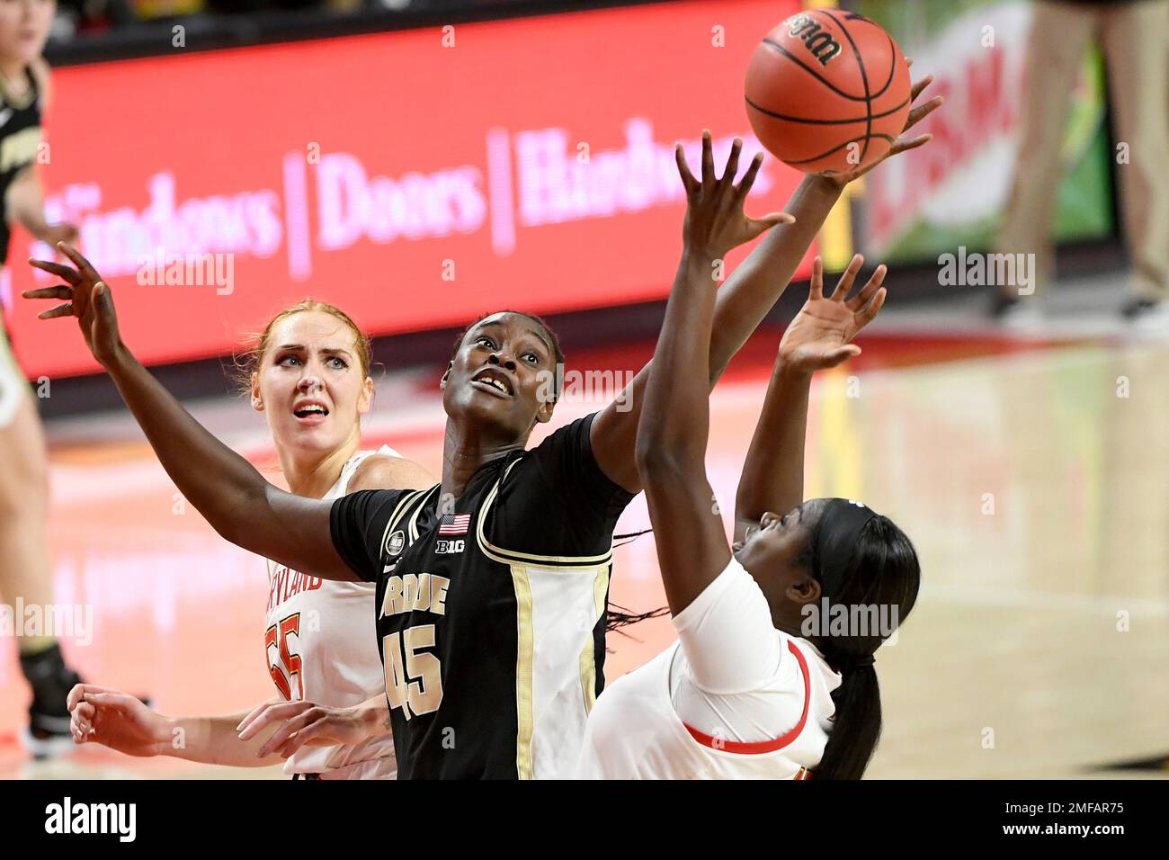 Purdue center Fatou Diagne (45) and Maryland guard Ashley Owusu (15 ...
