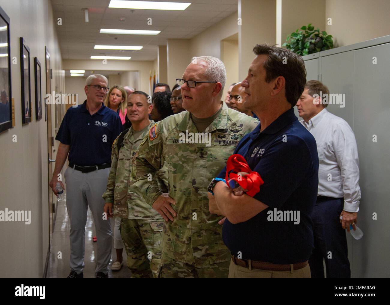 U.S. Army Lt. Gen. John R. Evans, U.S. Army North commanding general, shows Wayne Peacock ...