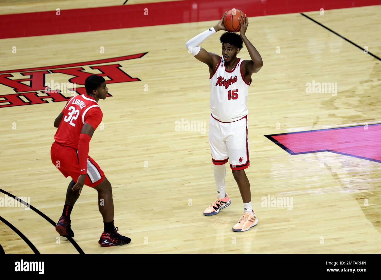 Rutgers center Myles Johnson (15) looks to pass around Ohio State ...