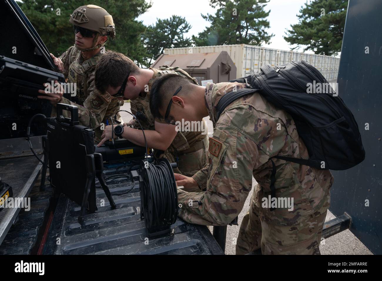 Airman 1st Class Justin Thomas, (left), Senior Airman Zakari Haines ...