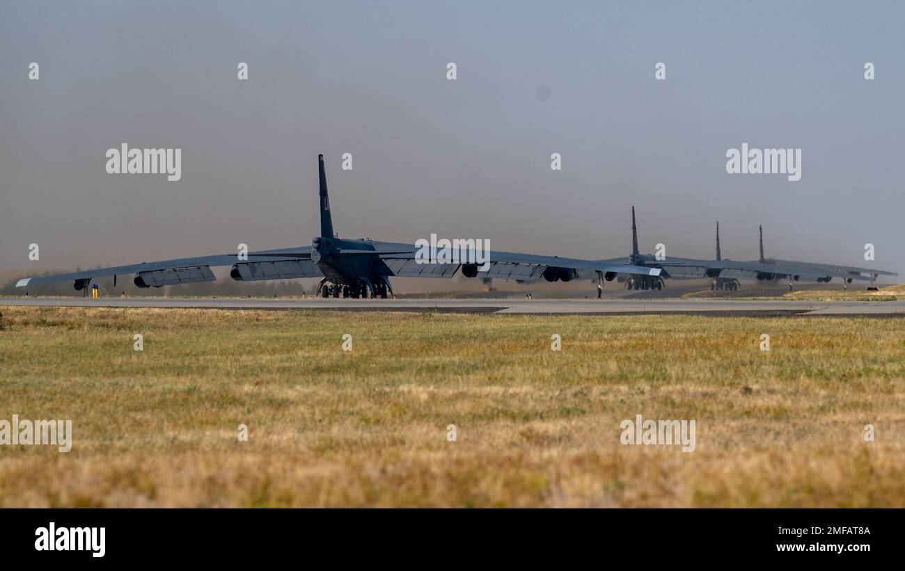 Four B-52H Stratofortresses taxi down the runway during an Agile Combat ...