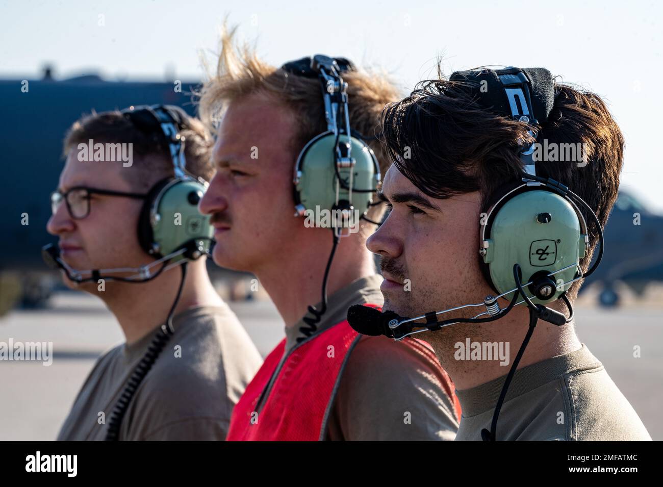 Staff Sgt. Patrick Gault, right,, Airman 1st Class Jacob Kellet, center ...