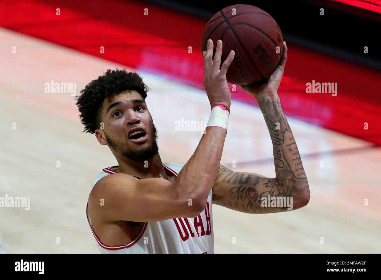 Utah forward Timmy Allen shoots during the second half of the team's ...