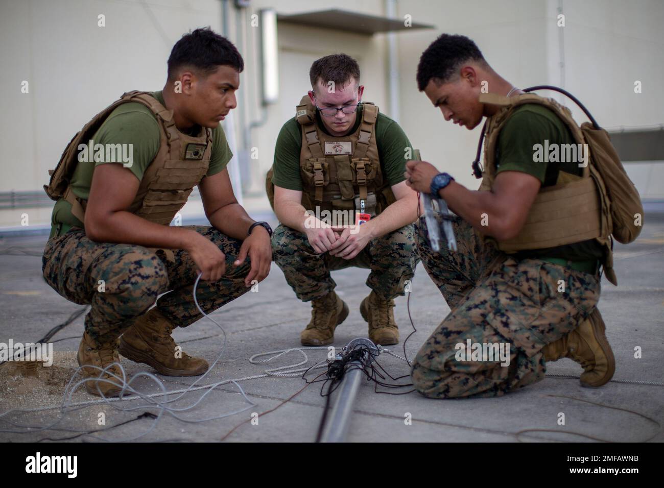 U.S. Marines with Marine Wing Communications Squadron (MWCS) 18 connect ...