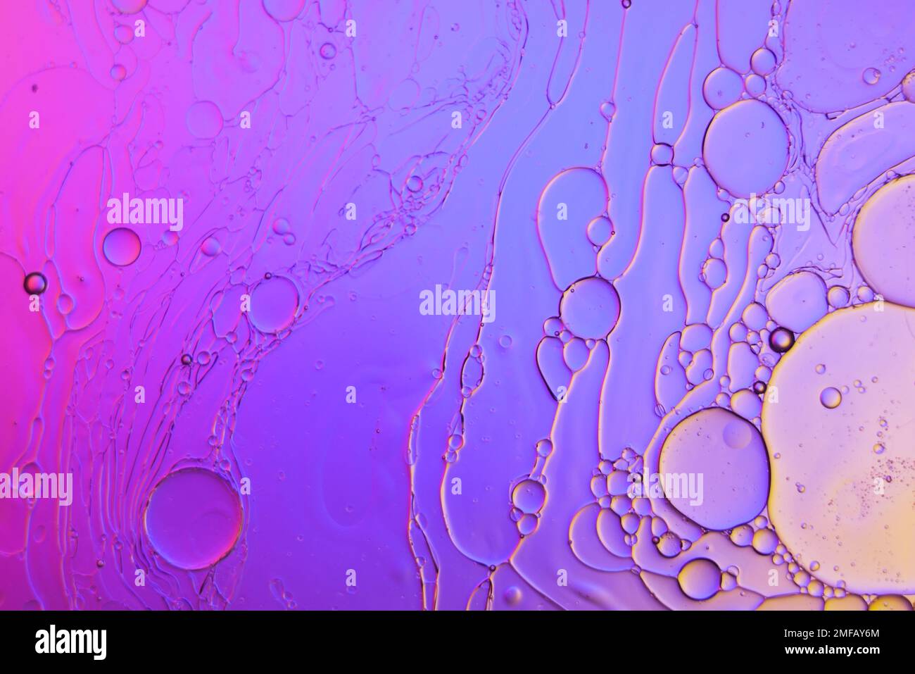Top view movement of oil bubbles in the liquid. Oil surface ...