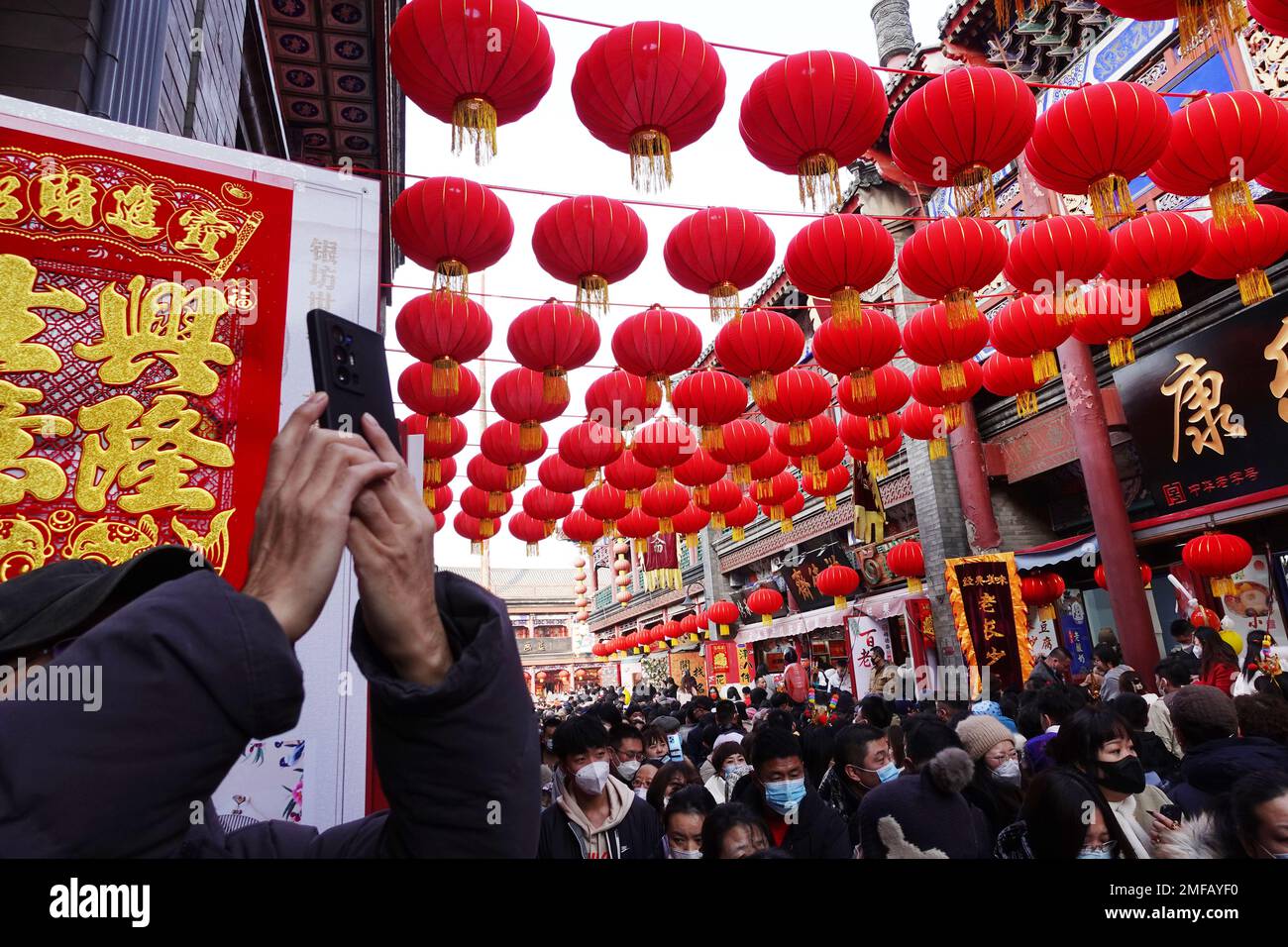 Crowded people in a temple fair to celebrate traditional Chinese Spring ...