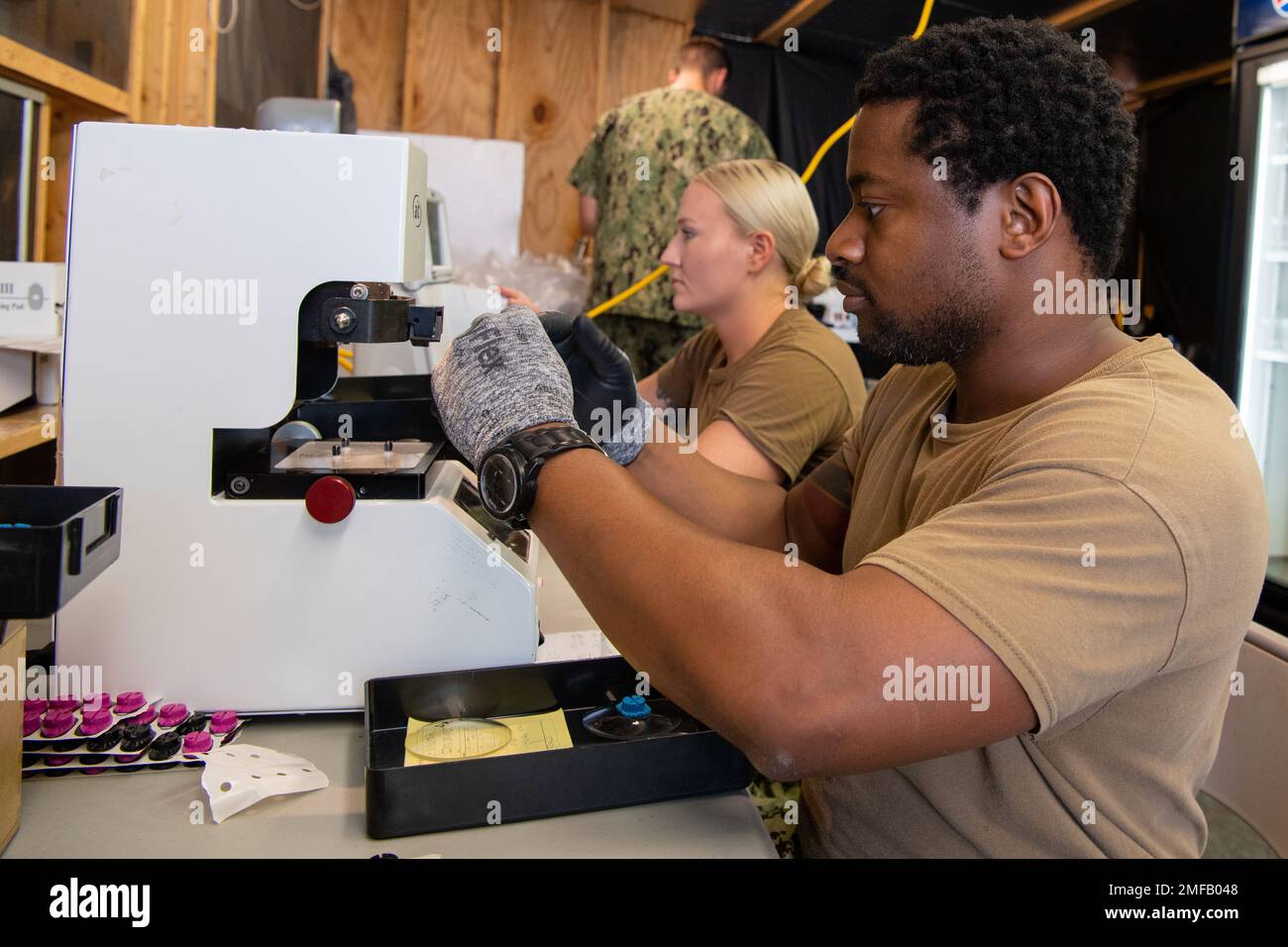 U.S. Navy Hospital Corpsman 3rd Class Emilio Matthew, an optician with ...