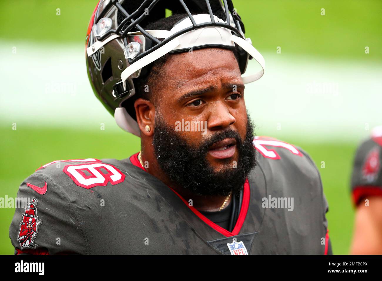 Tampa Bay Buccaneers offensive tackle Donovan Smith (76) walks to the ...