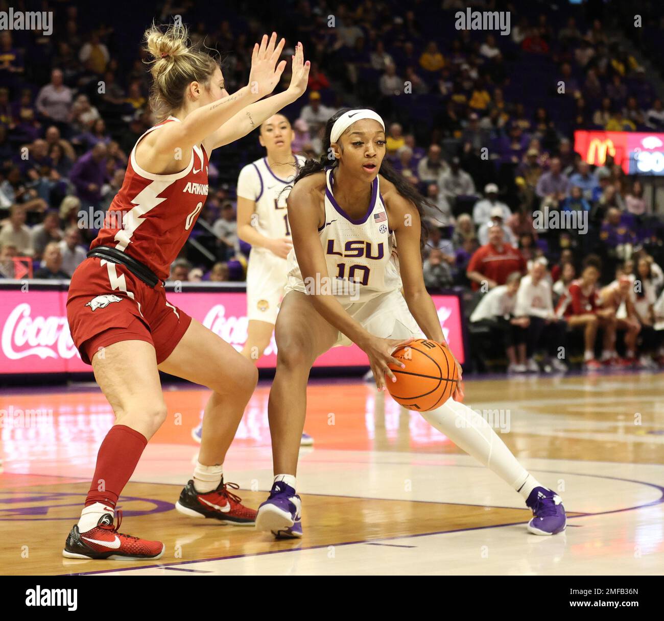 LSU Lady Tigers forward Angel Reese (10) makes a move on Arkansas ...
