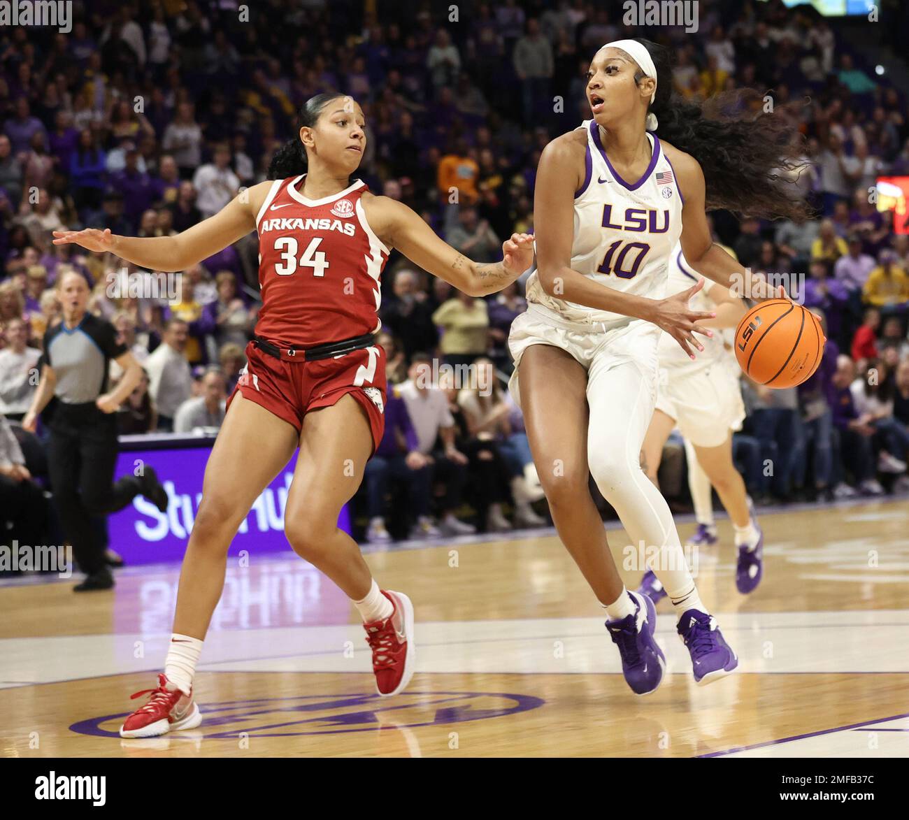 LSU Lady Tigers forward Angel Reese (10) makes a move on Arkansas ...