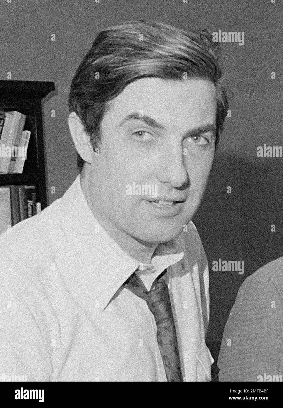 FILE - Reporter Neil Sheehan is shown in an office of the New York ...