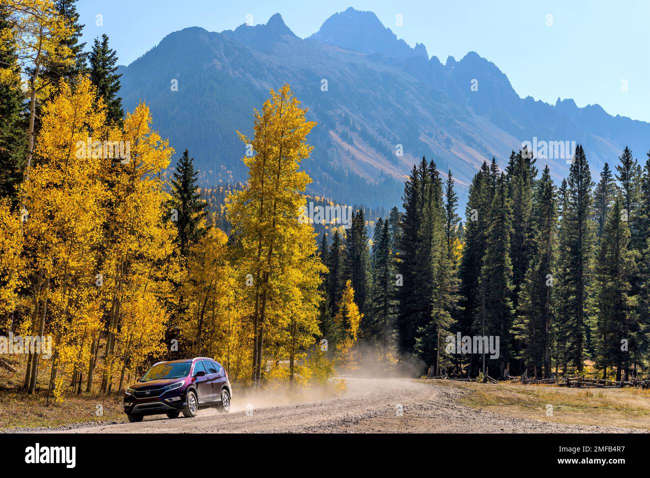 Car driving down winding road hi-res stock photography and images - Alamy