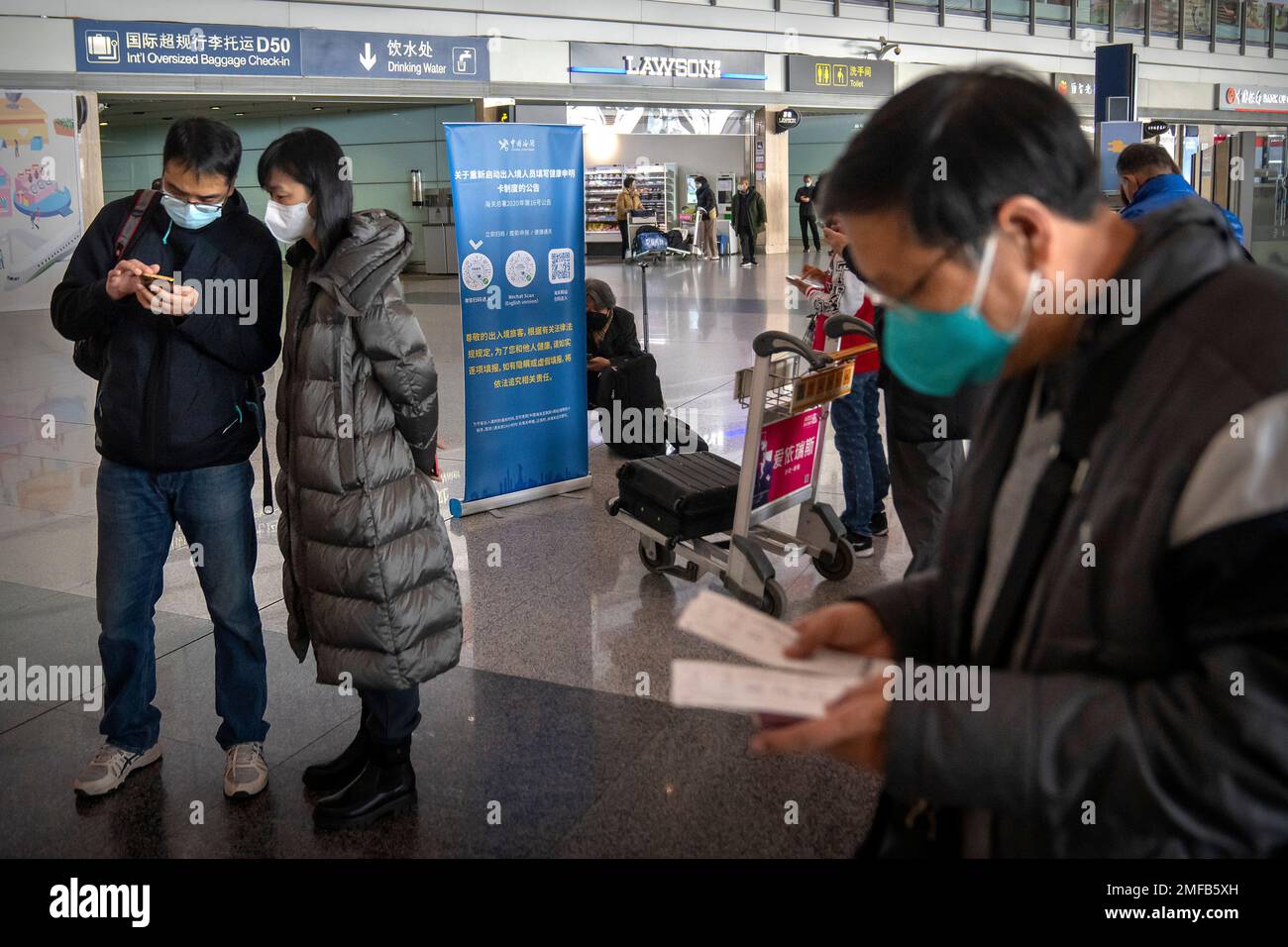 Travelers fill out an online electronic customs health declaration form ...