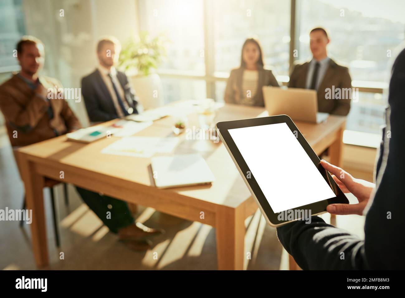 Using technology to make his presentation great. an unrecognizable ...