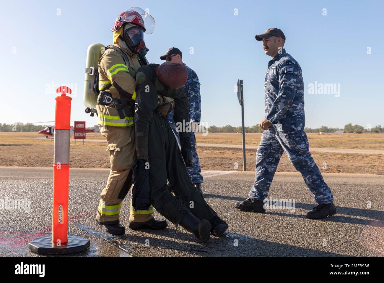 Royal Australian Air Force (RAAF) Sgt. Travis McGregor, a firefighter ...
