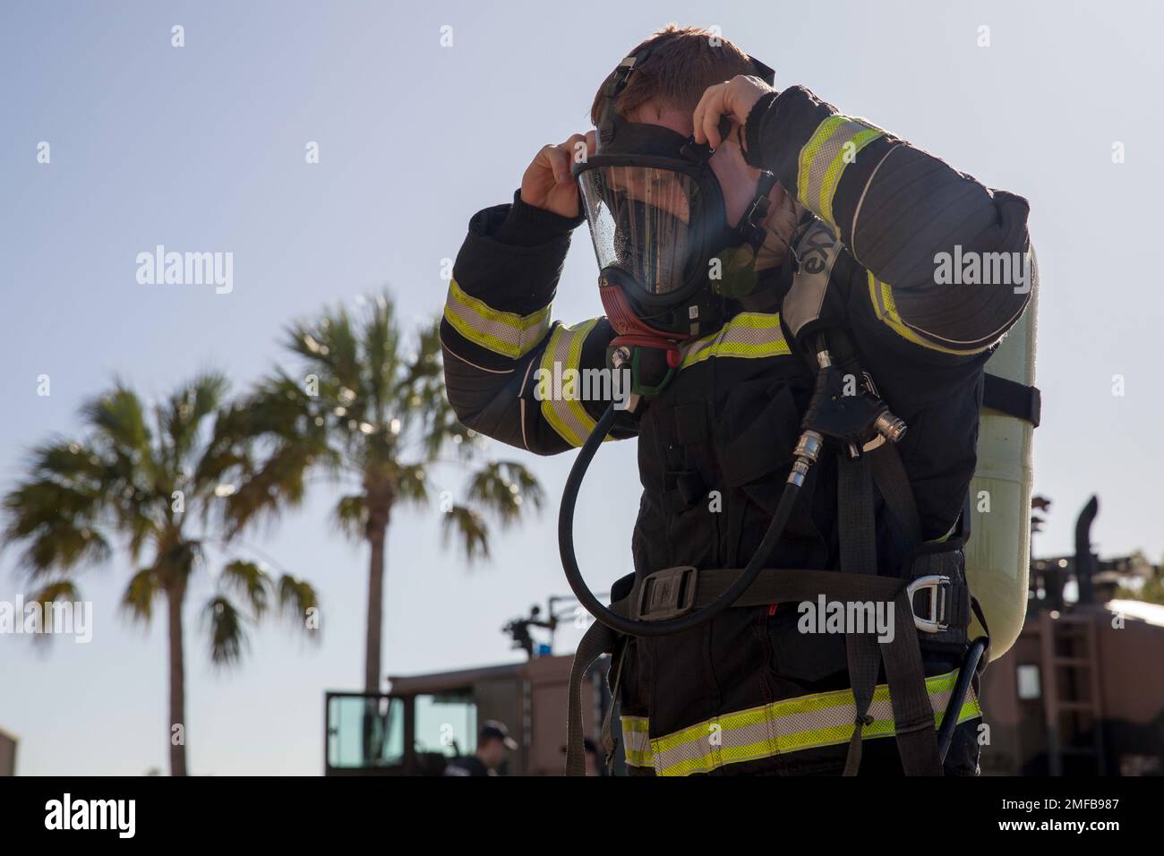 Royal New Zealand Air Force (RNZAF) LAC. Jamie Hepworth, a firefighter ...