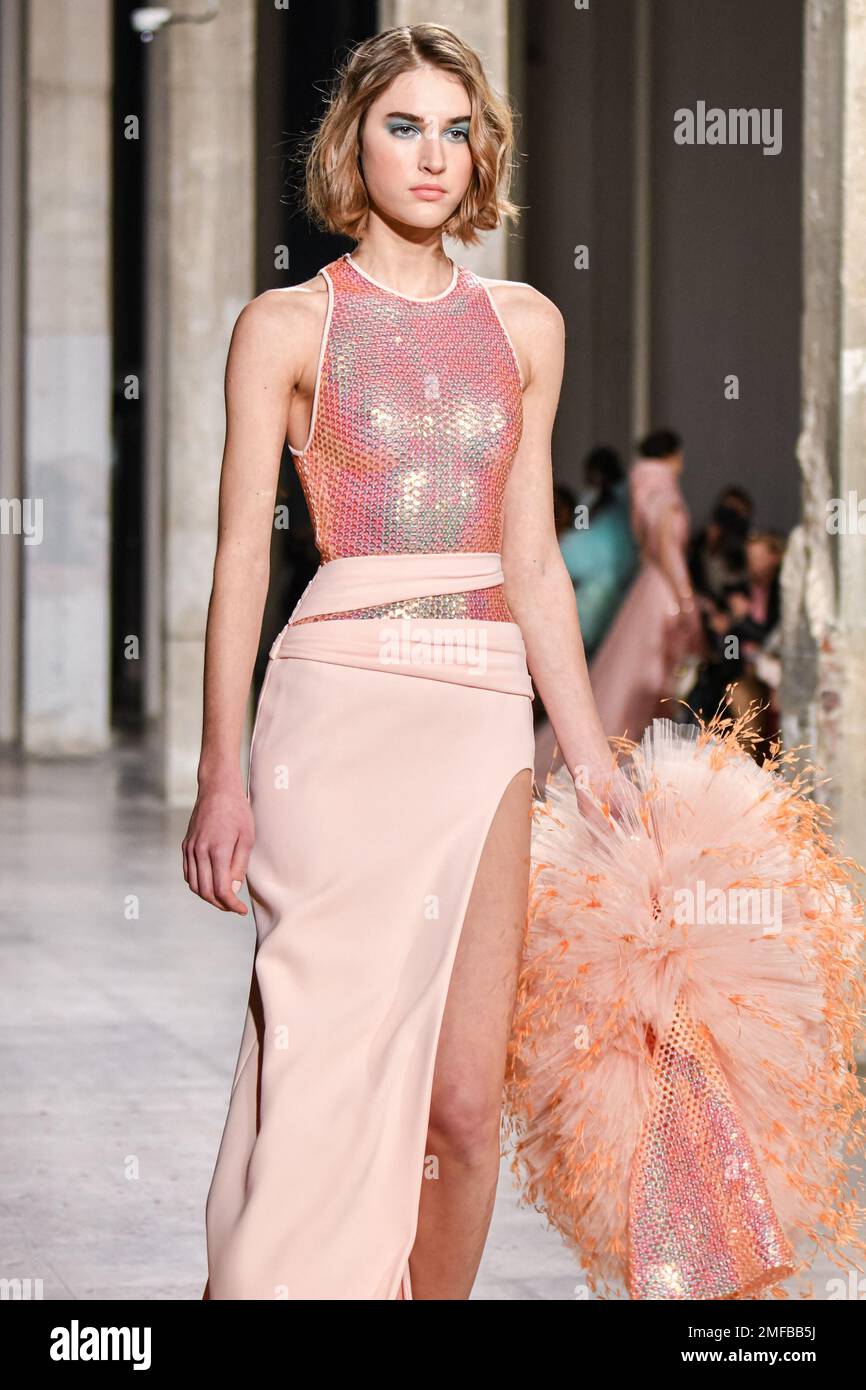 A model walks the runway at the Georges Chakra Haute Couture Spring ...