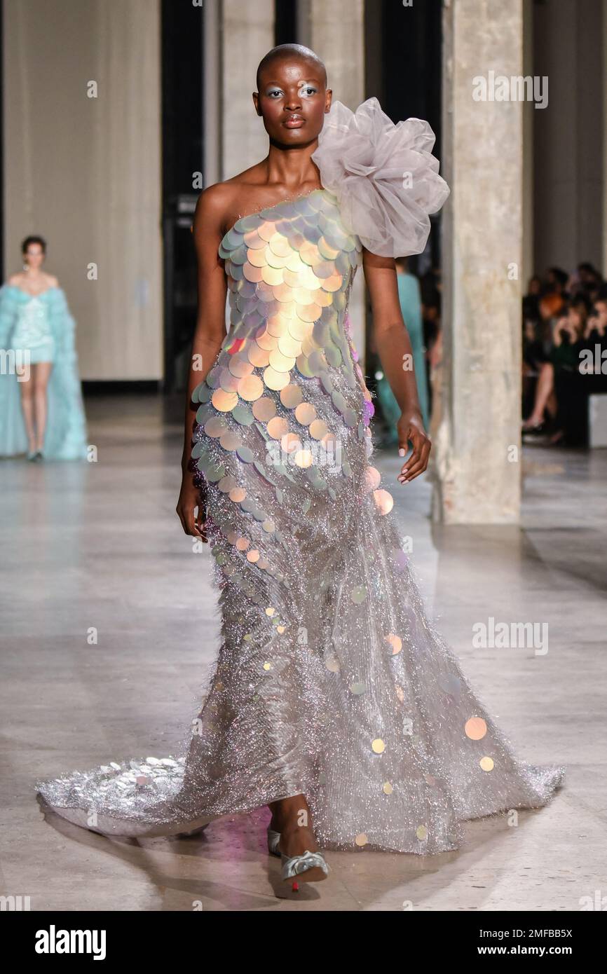 A model walks the runway at the Georges Chakra Haute Couture Spring ...