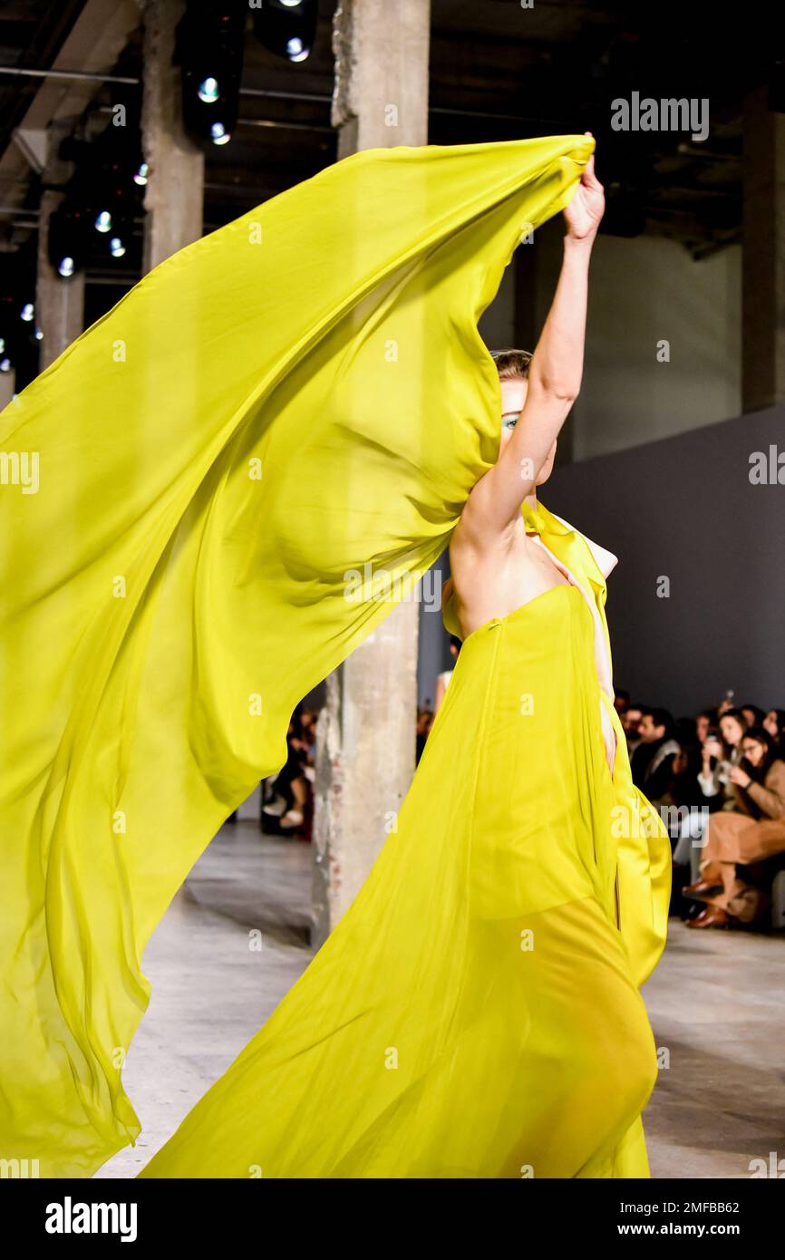 A model walks the runway at the Georges Chakra Haute Couture Spring ...