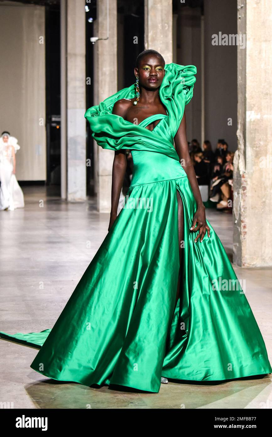 A model walks the runway at the Georges Chakra Haute Couture Spring ...